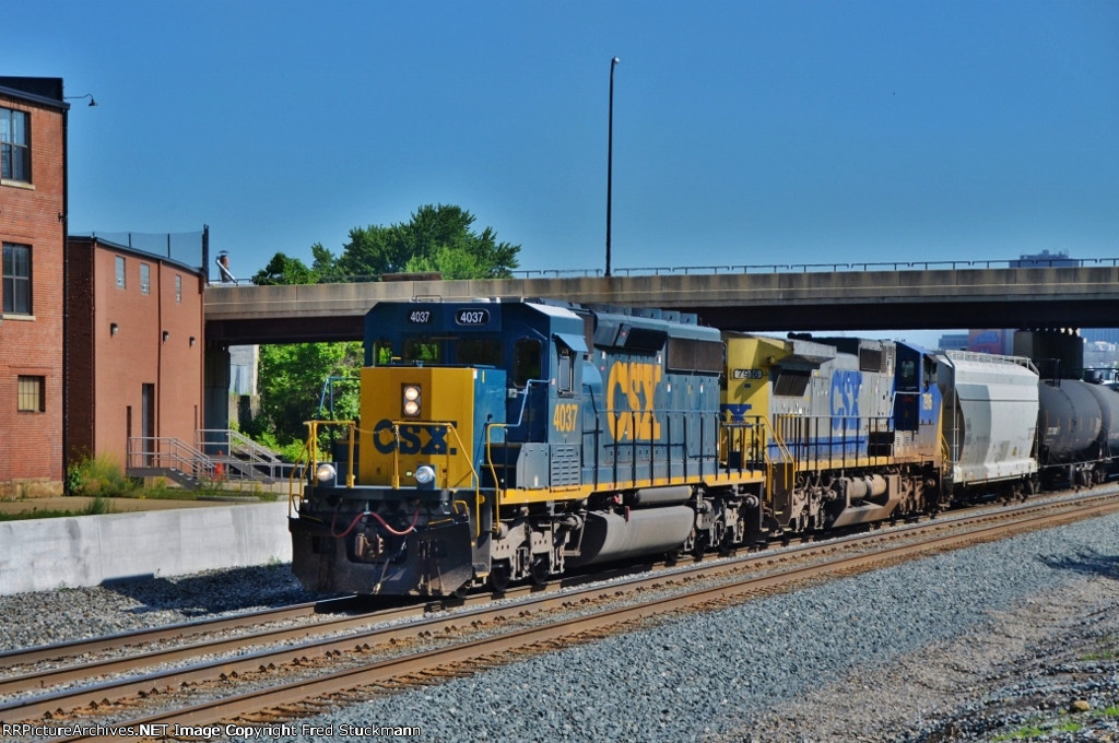 CSX 4037 with it's stern brow, leads the charge.
